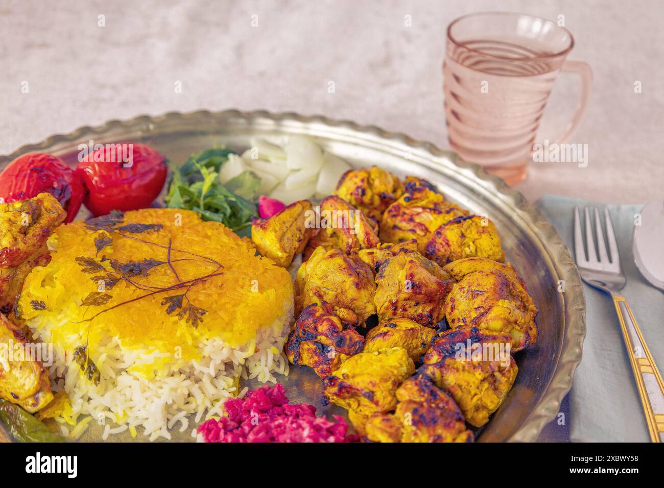 Healthy and colorful middle eastern food with chicken kebab, saffron ...