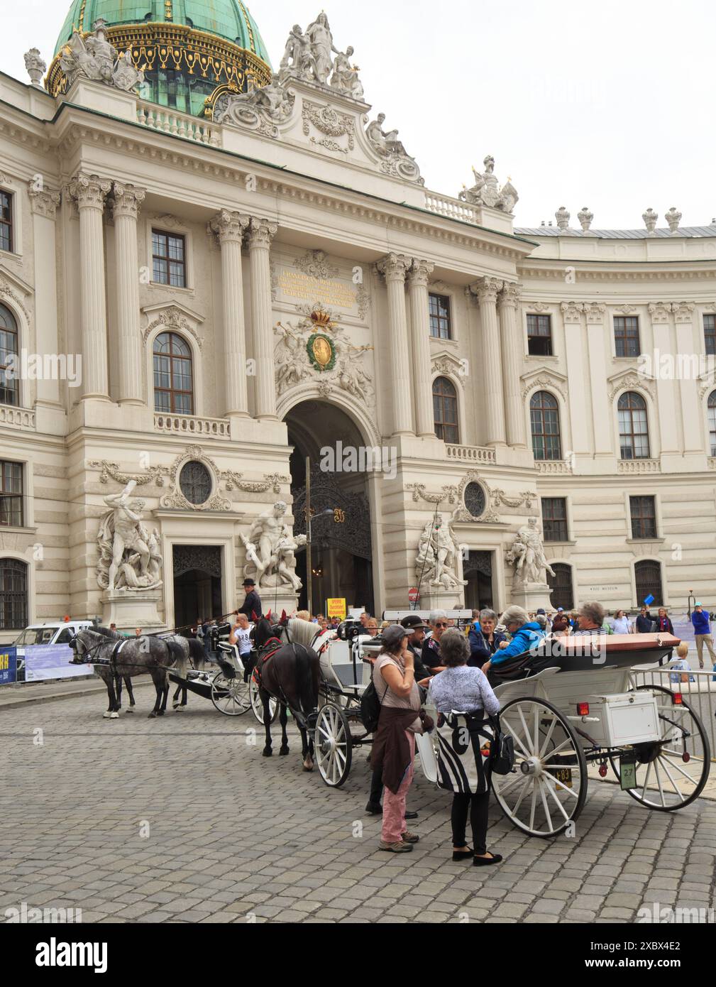 Vienna, Austria, 23-05-24. Hofsburg Palce with horse and carts waiting ...