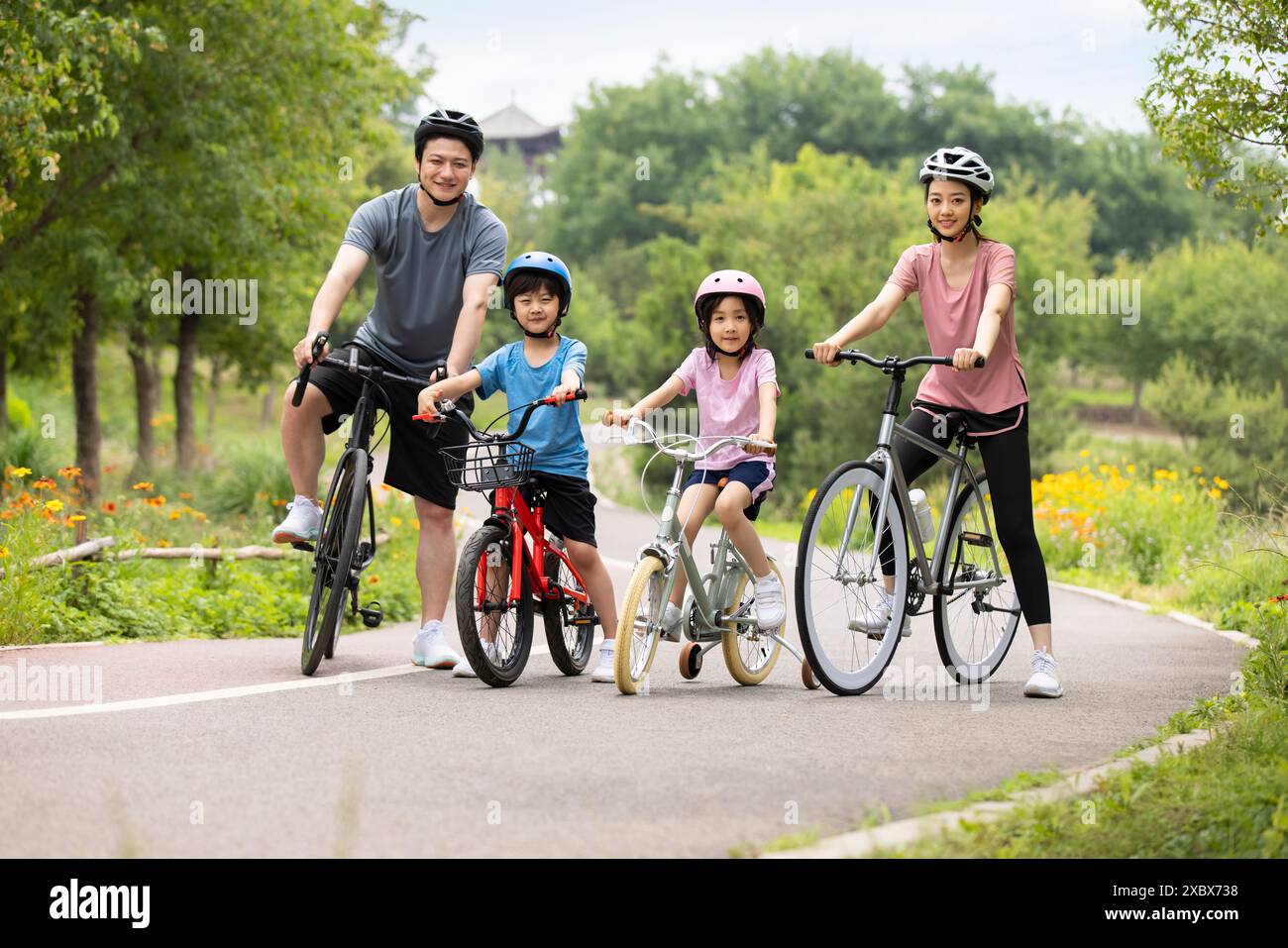 Child riding bicycle side view helmet hi-res stock photography and ...
