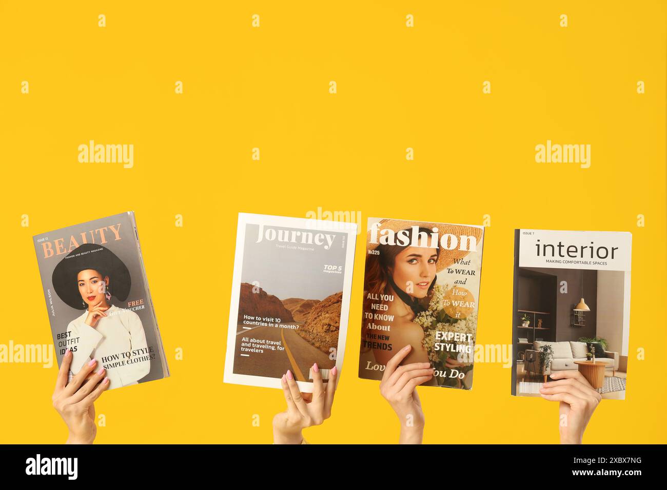 Female hands with different magazines on yellow background Stock Photo ...