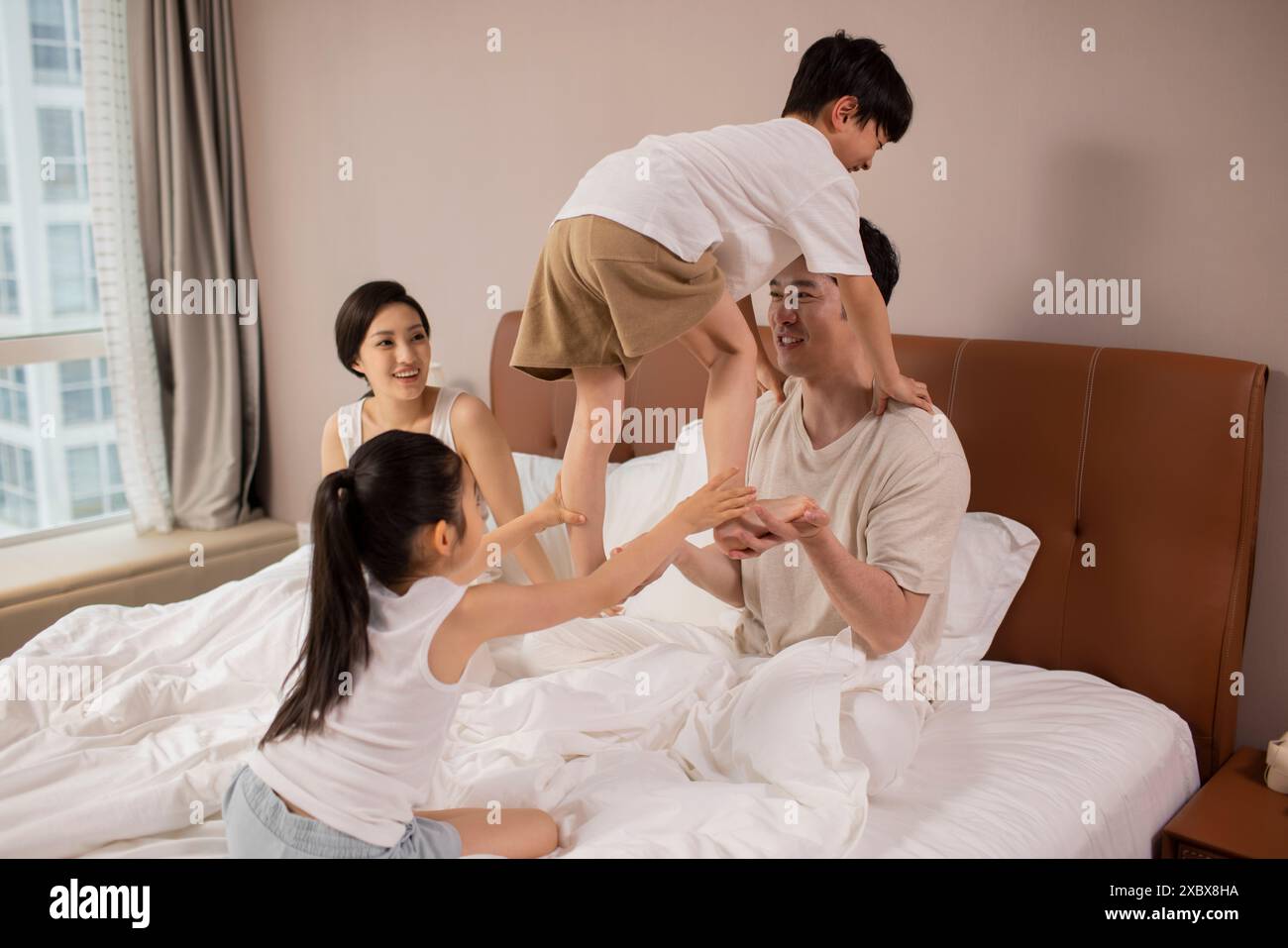Rough Housing Before Bedtime Stock Photo - Alamy