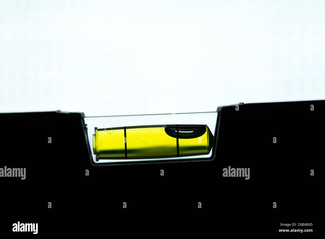 tubular spirit level, inclined, out of balance Stock Photo - Alamy