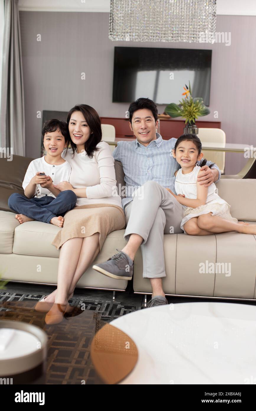 Young mother son watching tv hi-res stock photography and images - Alamy