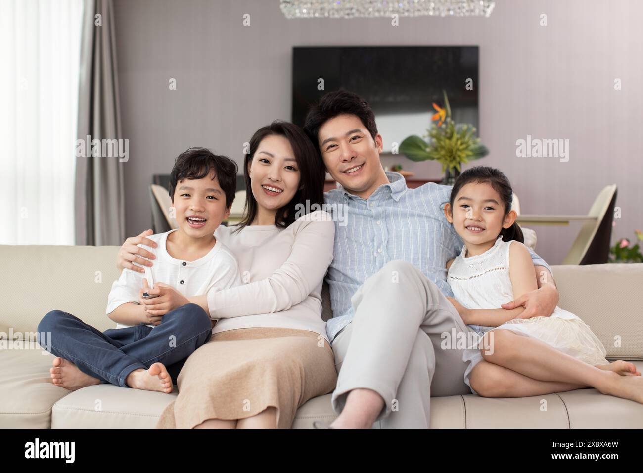 Asian mother daughter watching tv hi-res stock photography and images - Alamy