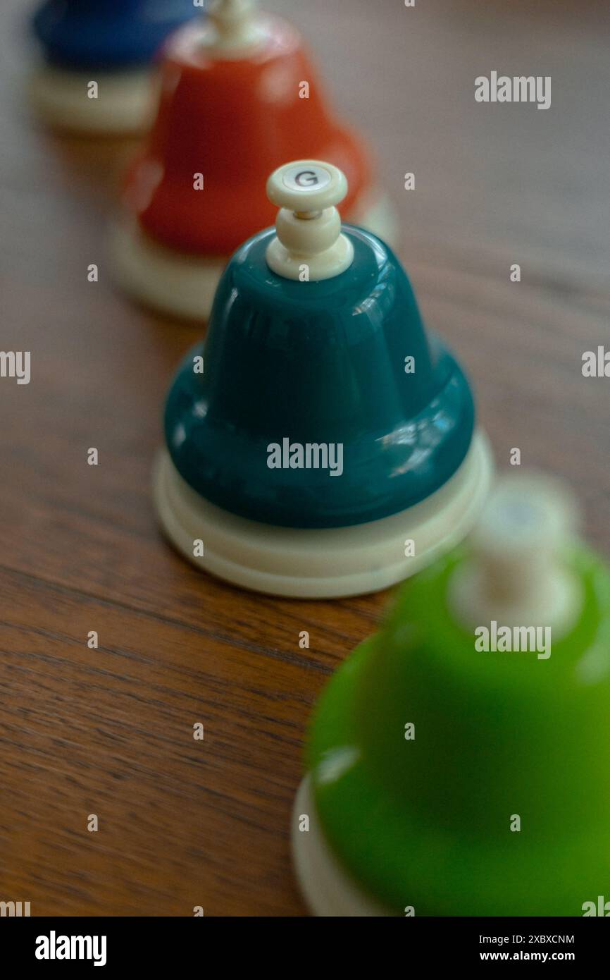 musical colorful bells on the floor Stock Photo - Alamy