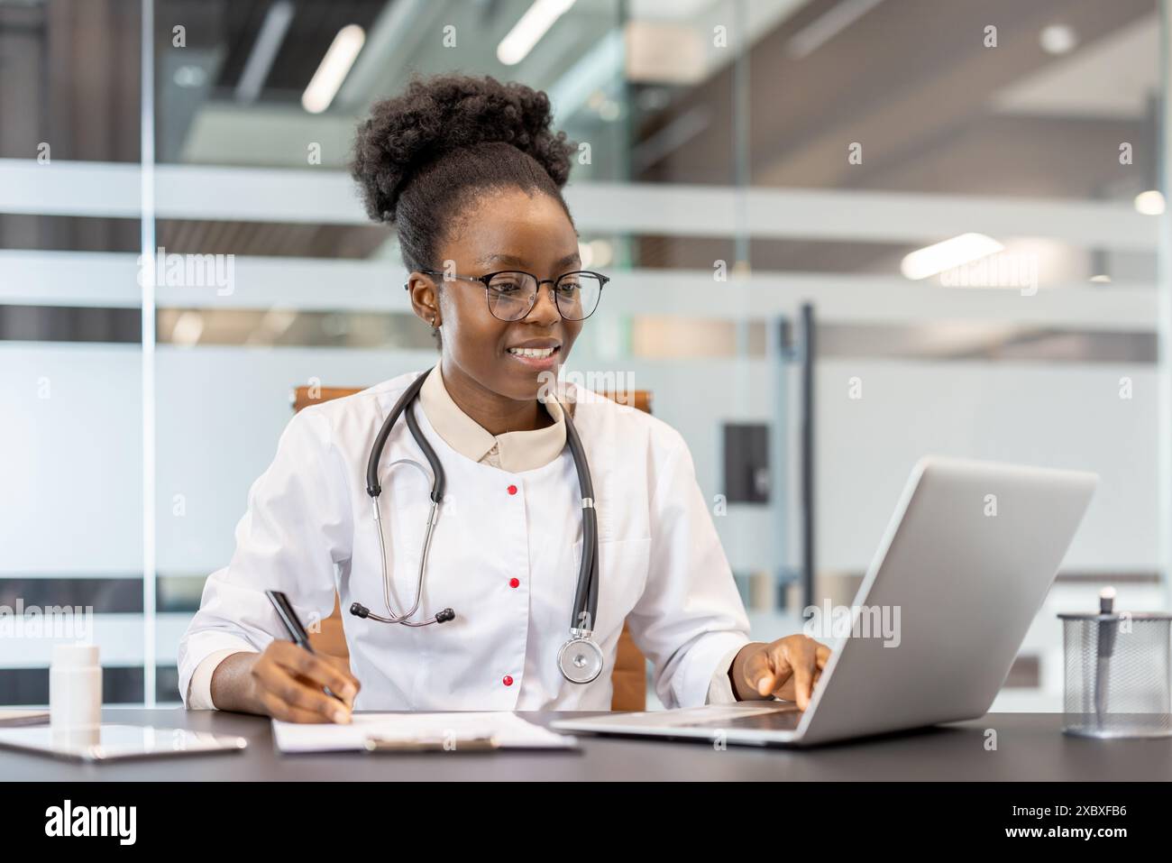 Doctor stethoscope taking notes hi-res stock photography and images - Alamy