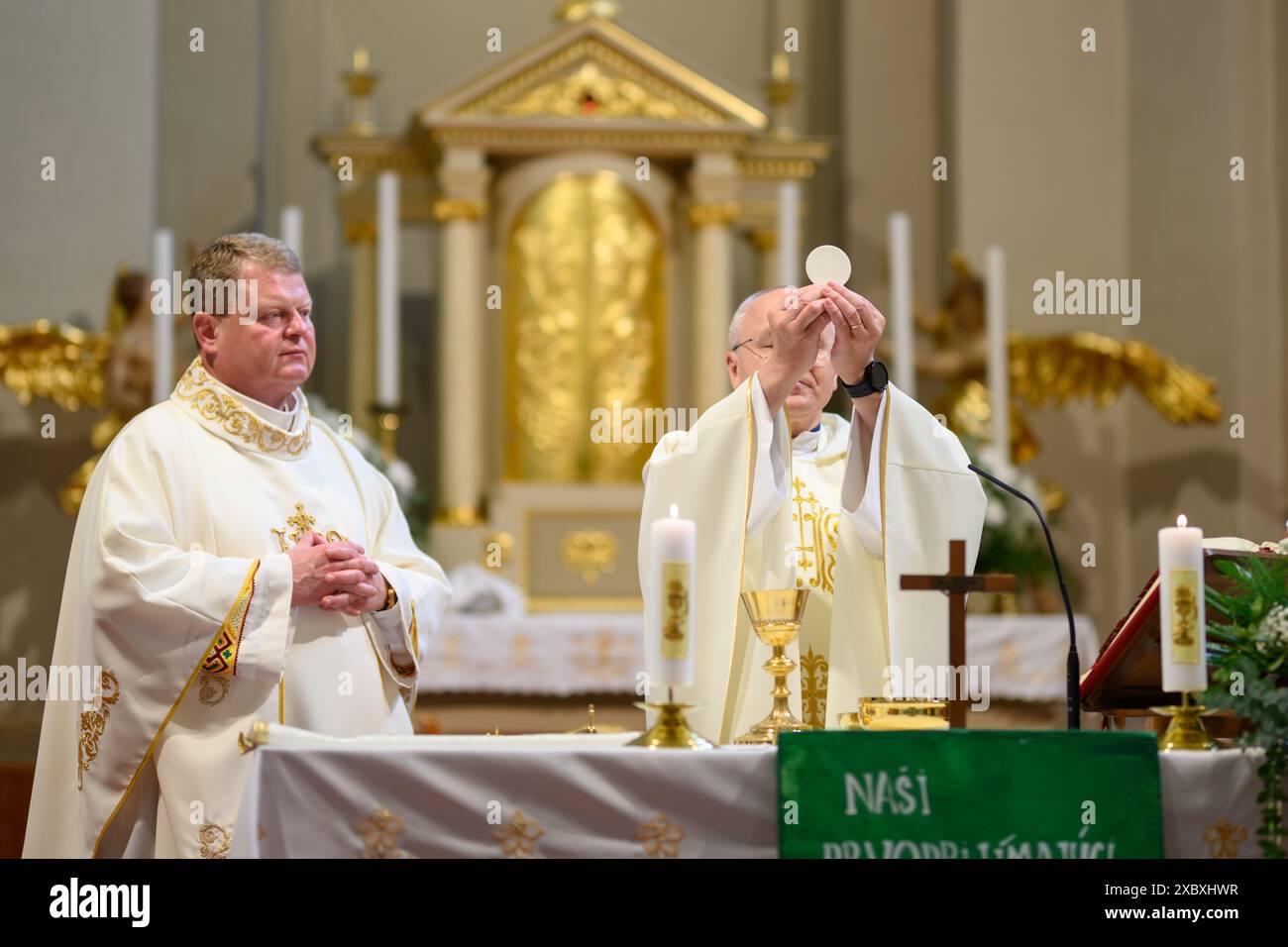 The Consecration moment of the Holy Mass Stock Photo - Alamy