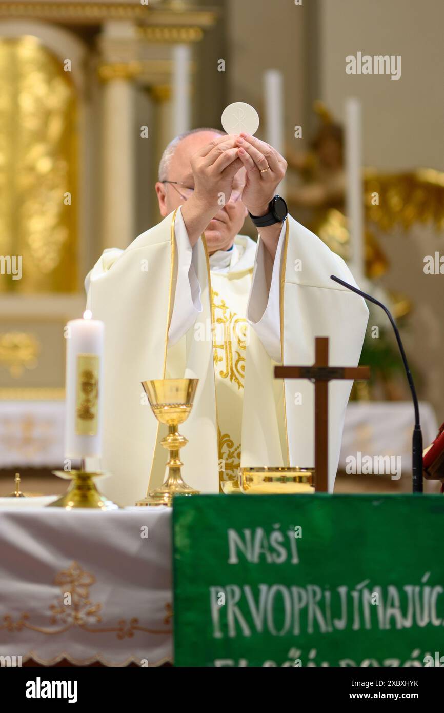 The Consecration moment of the Holy Mass Stock Photo - Alamy