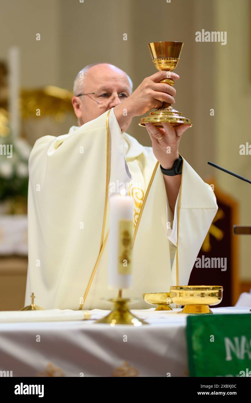 The Consecration moment of the Holy Mass Stock Photo - Alamy