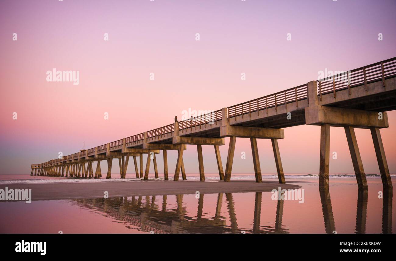 The magical colors of dusk reflecting in shallow pools of water on ...