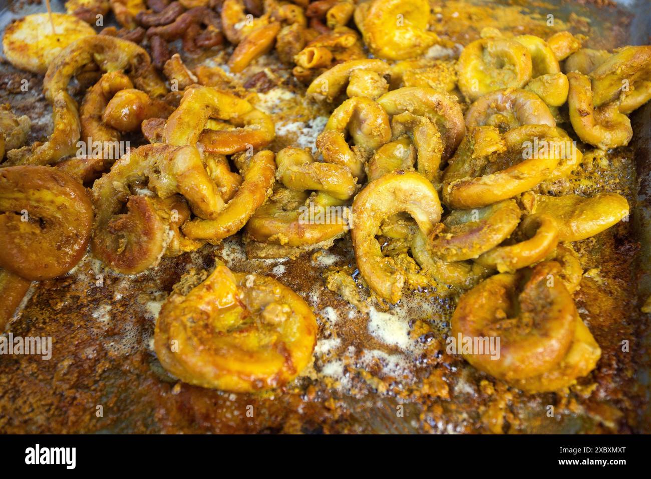 Roasted chinchulin at street stall - Small intestine of the cow Stock ...