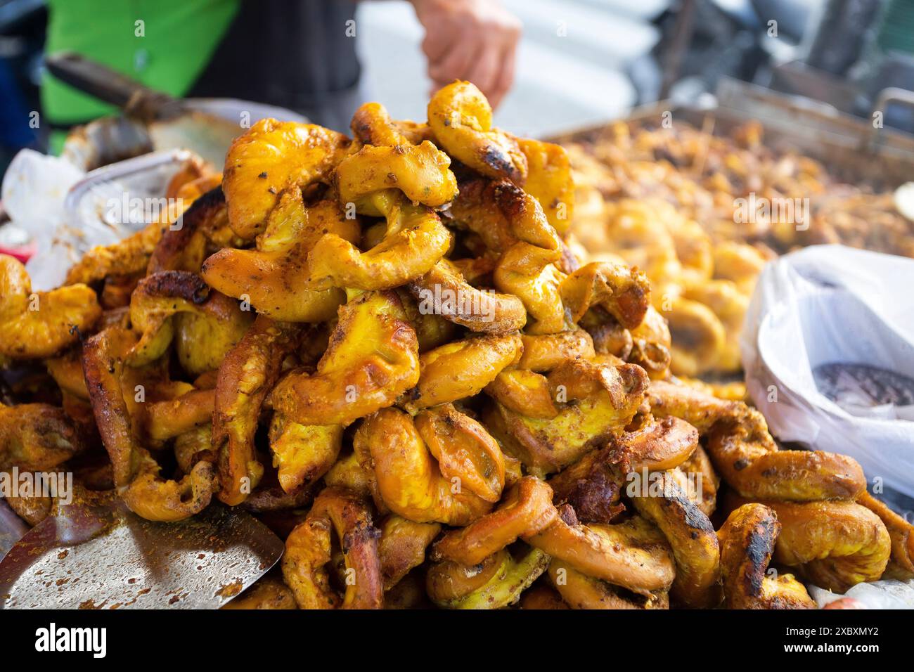 Roasted chinchulin at street stall - Small intestine of the cow Stock ...