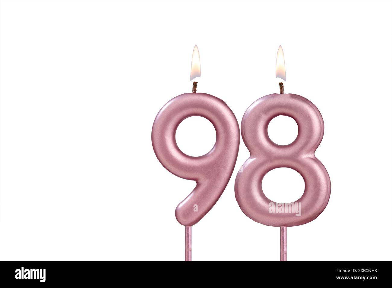 Lit birthday candle - Candle number 98 on white background Stock Photo ...