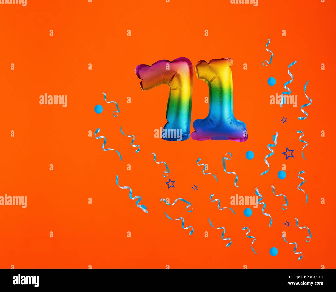 Confetti explosion with number 71 balloon - Celebration on orange ...