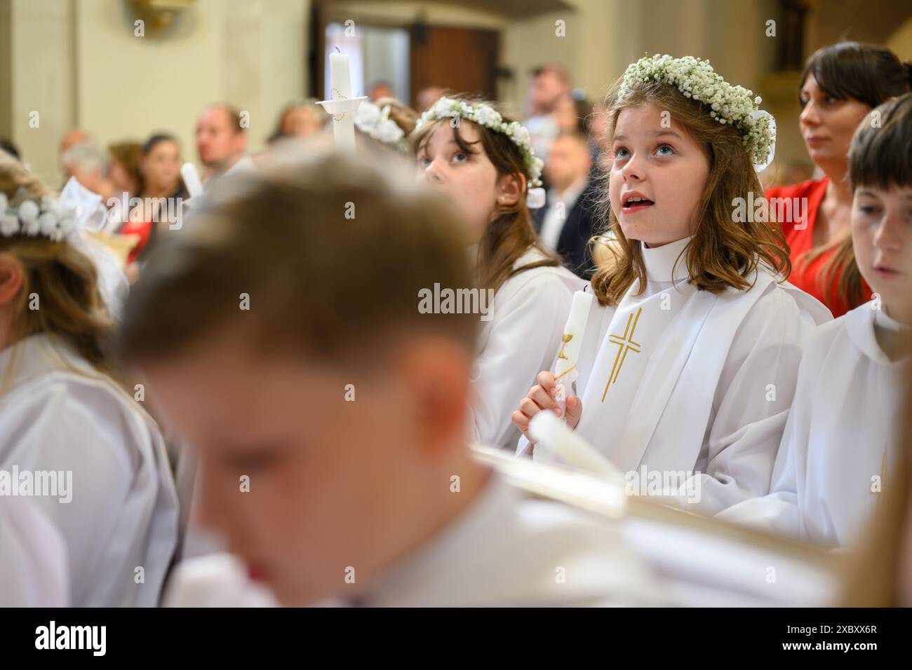 Children in pews at their First Holy Communion Mass Stock Photo - Alamy