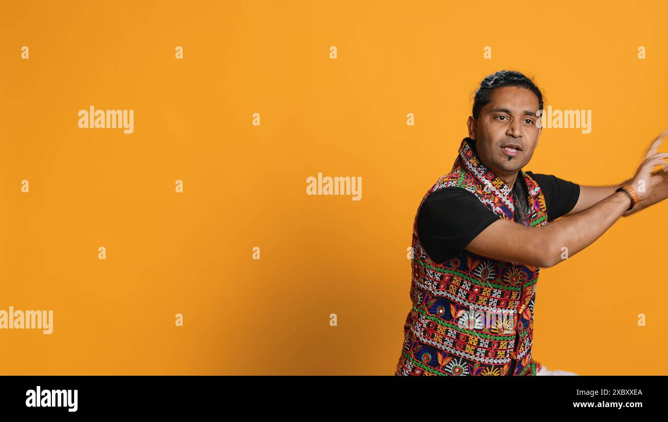 Smiling indian dancer moves energy hi-res stock photography and images ...