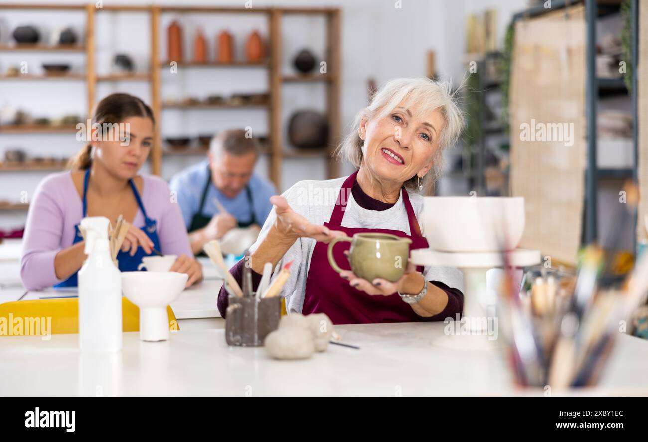 Lady pottery works hi-res stock photography and images - Alamy