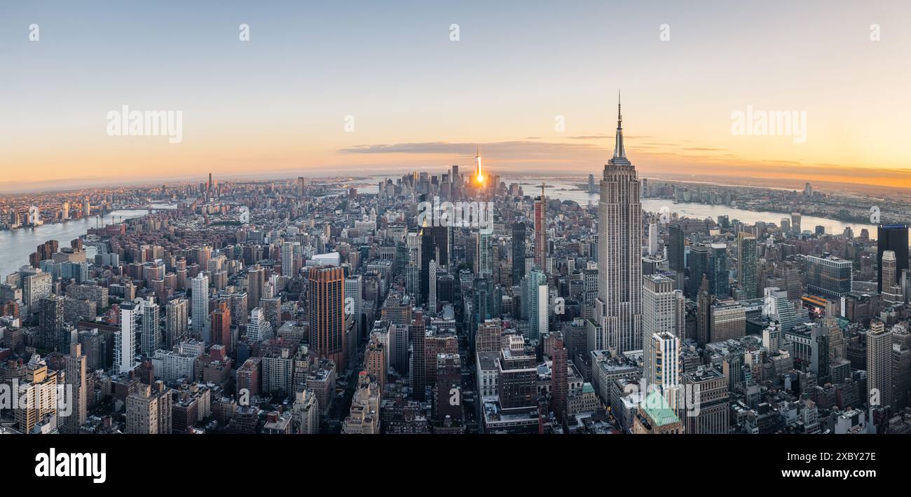 Aerial panorama of the Empire State Building and downtown Manhattan at ...