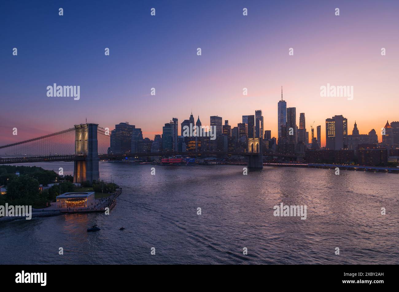 Brooklyn Bridge and New York City skyline across the East River ...