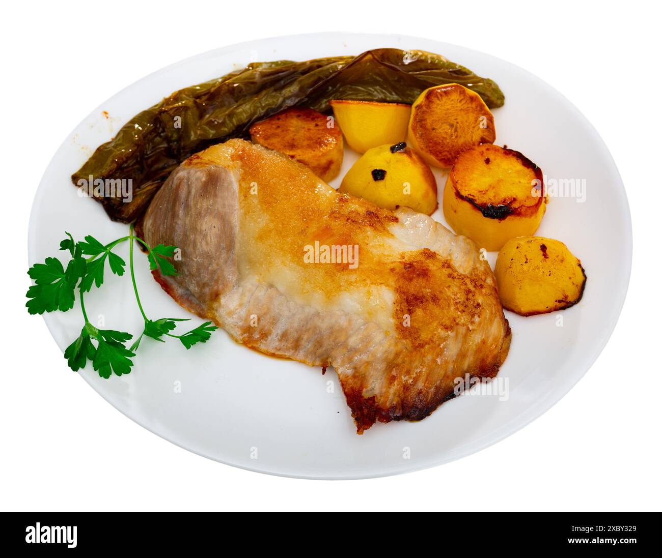 Fried pork served with potatoes and stewed pepper. Traditional Spain ...