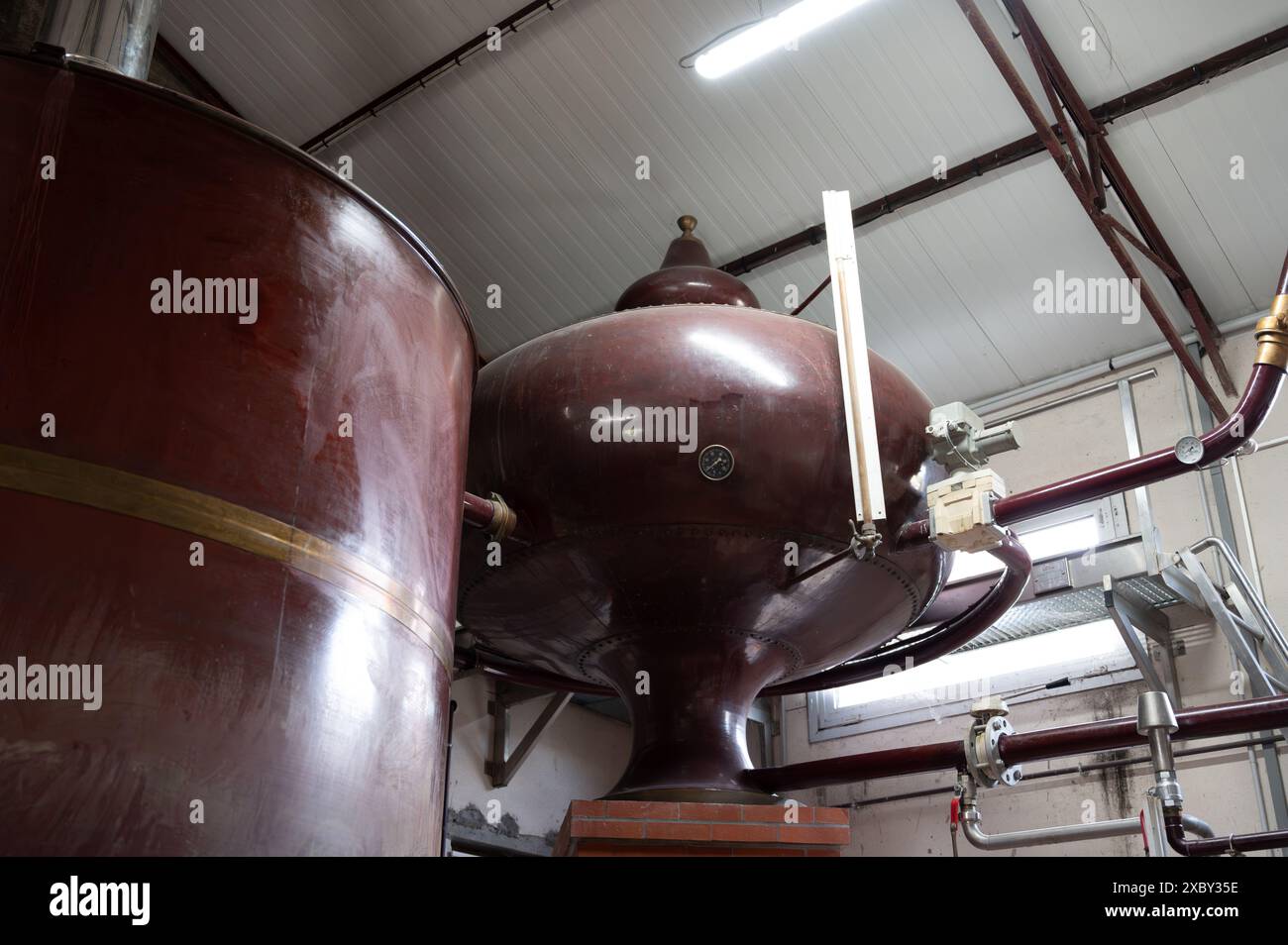 Double distillation process of cognac spirits in Charentias copper ...