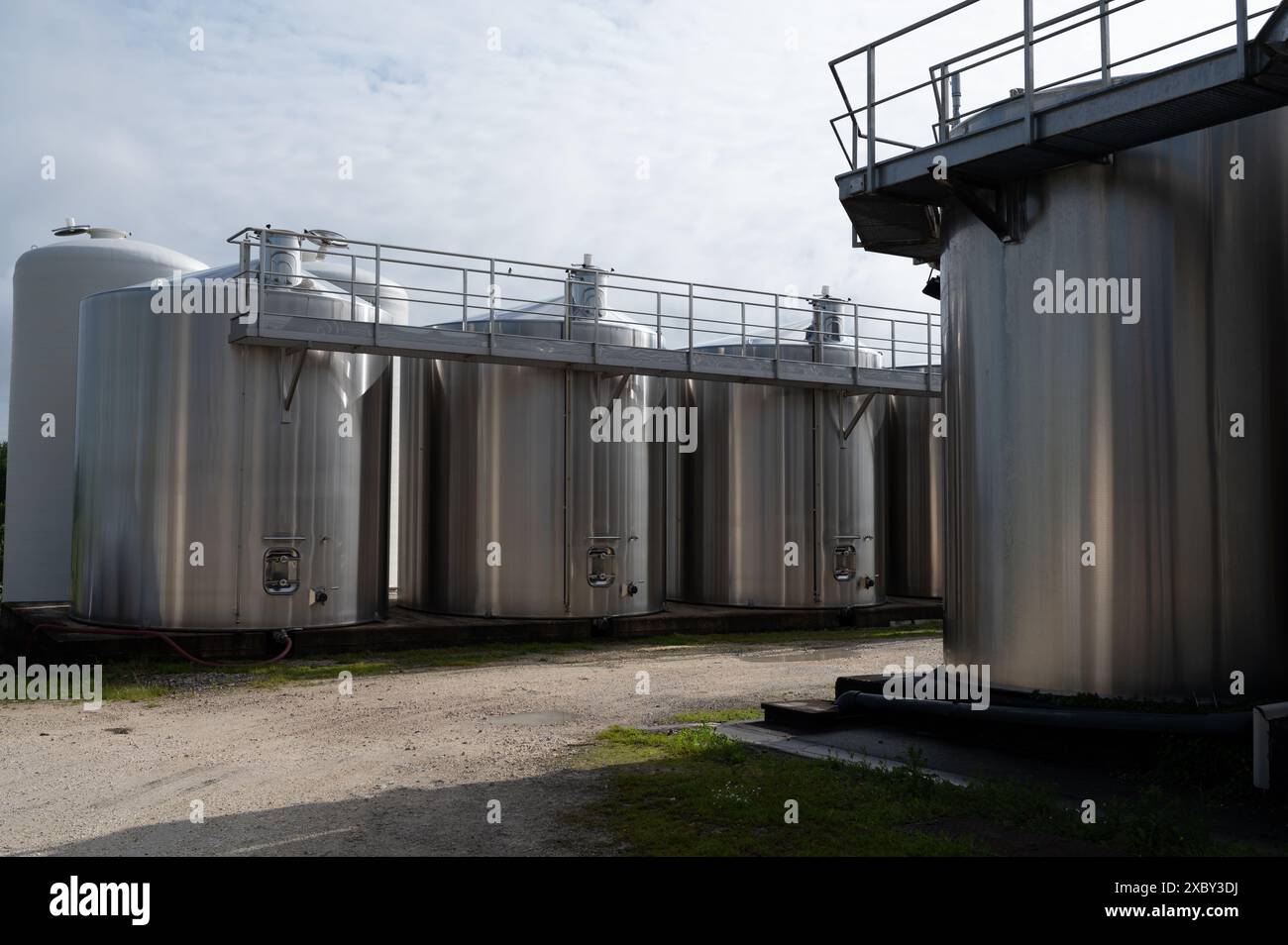 Works at cognac spirit distillery in Cognac white wine region, Charente ...