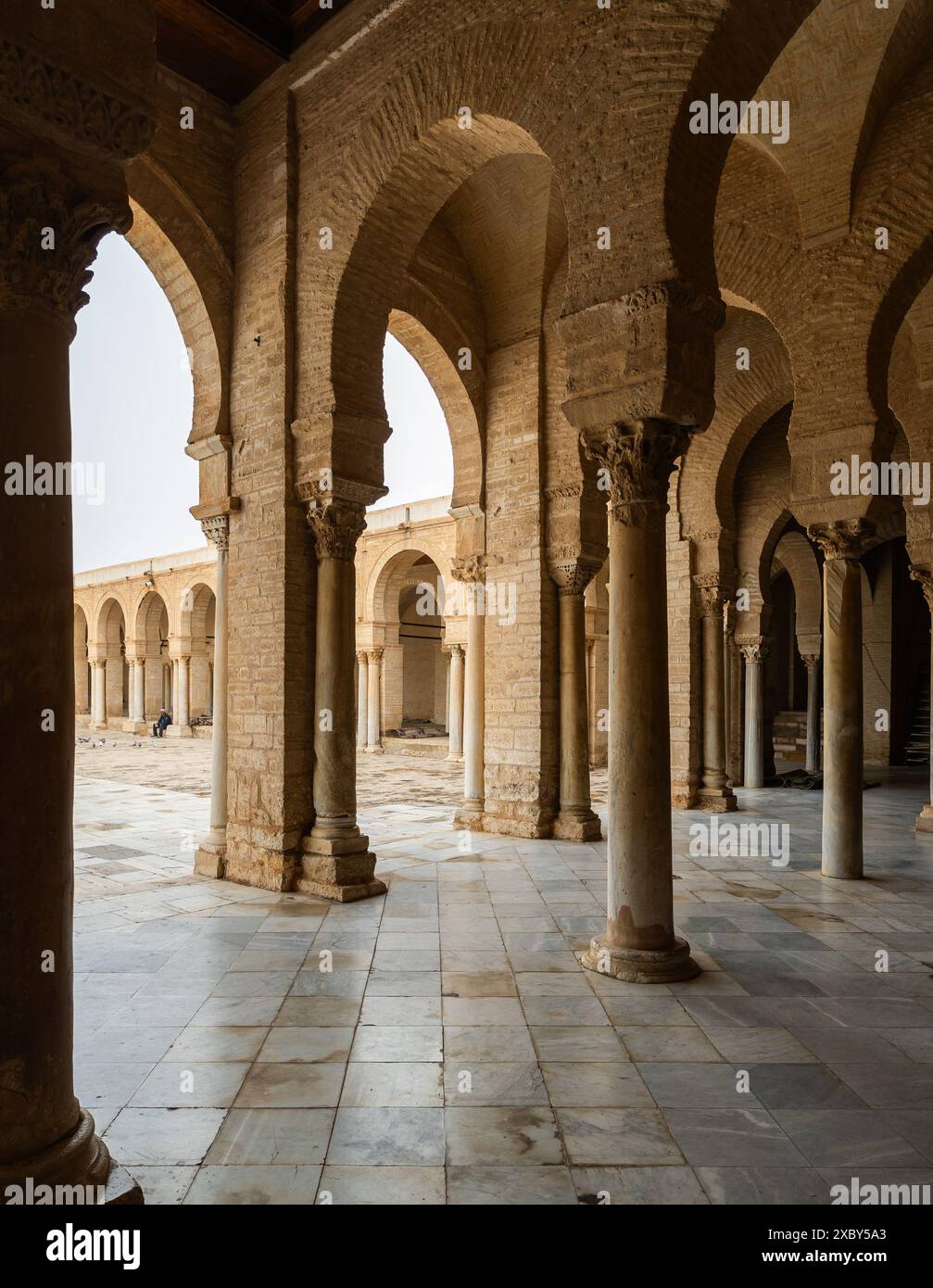 Corridor gallery around inner courtyard of Great Mosque of Kairouan ...