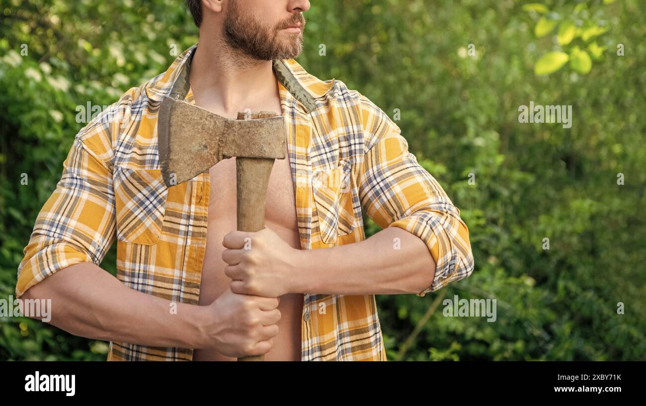 photo of lumberjack with axe, copy space. lumberjack with axe ...
