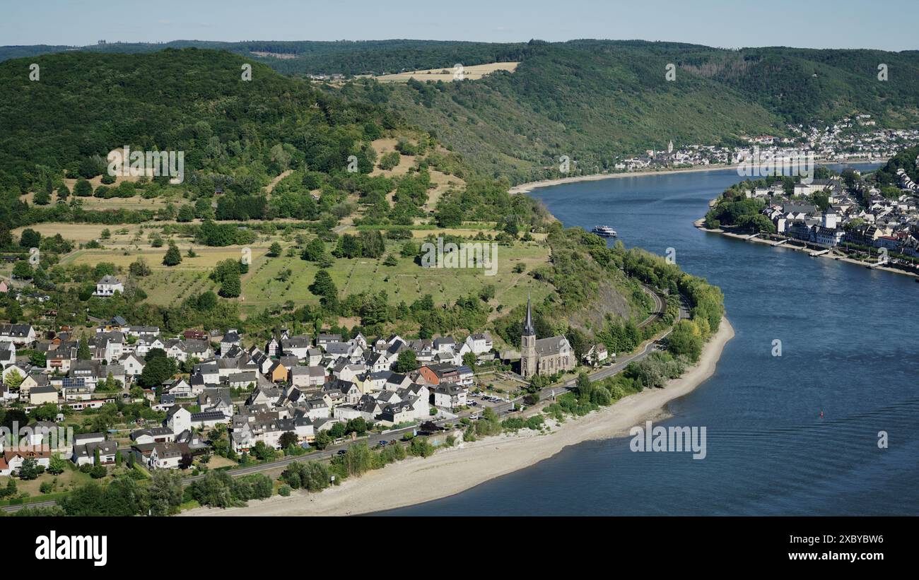Elevated view of the winding Rhine River showing the town of Filsen and ...