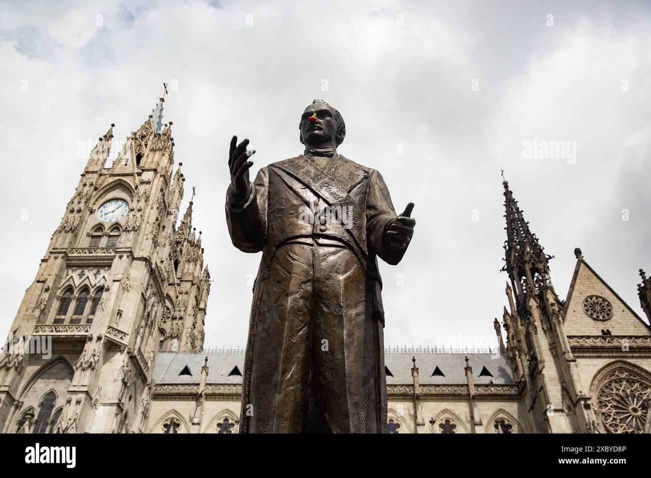 Statue of Garica Moreno with Basílica del Voto Nacional in the ...