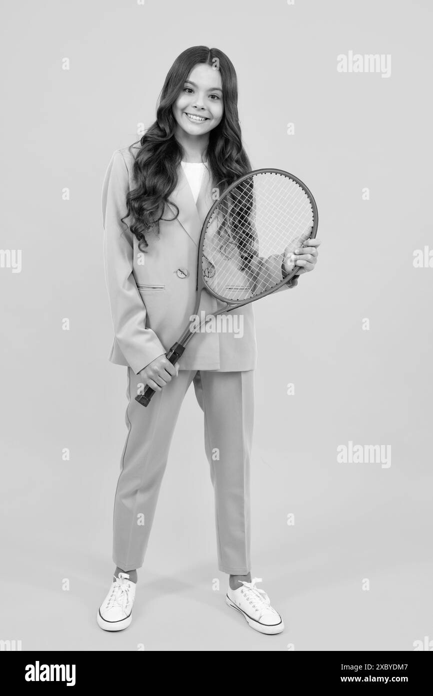 Fashion and sport concept. Teenager child with tennis racquet. Kids ...