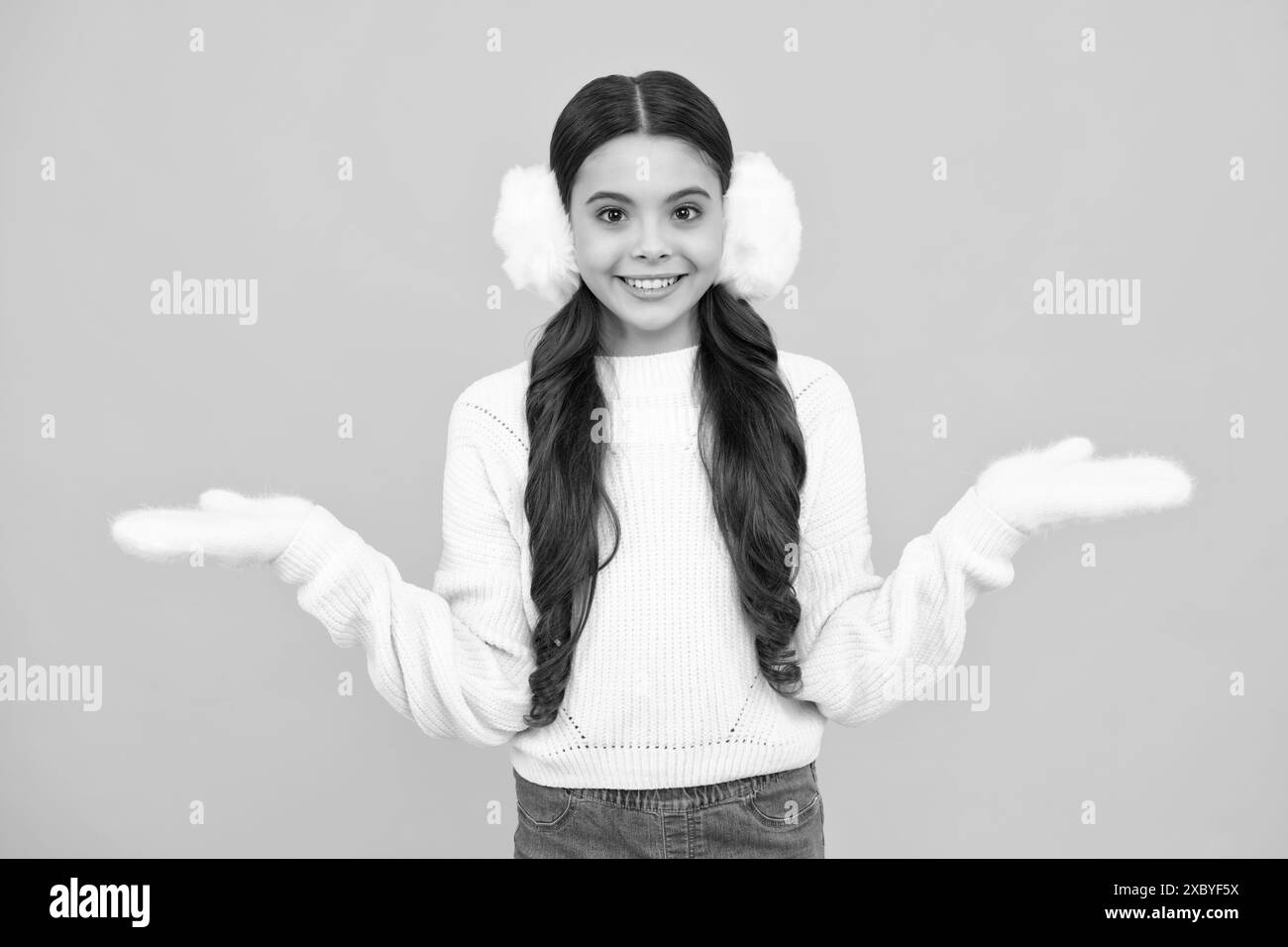 Modern teen girl wearing sweater and winter warm earmuff ear-flaps on ...