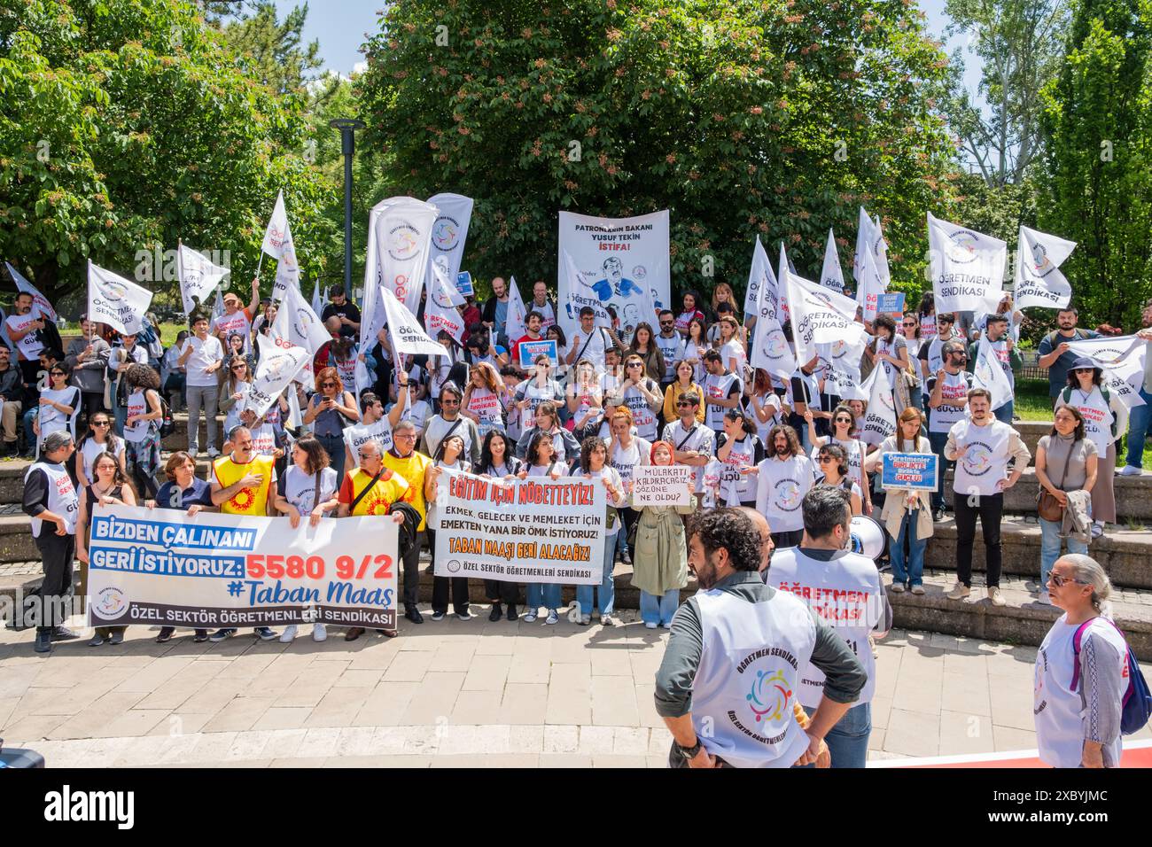Teachers and wave union flags at the park of the Grand National ...