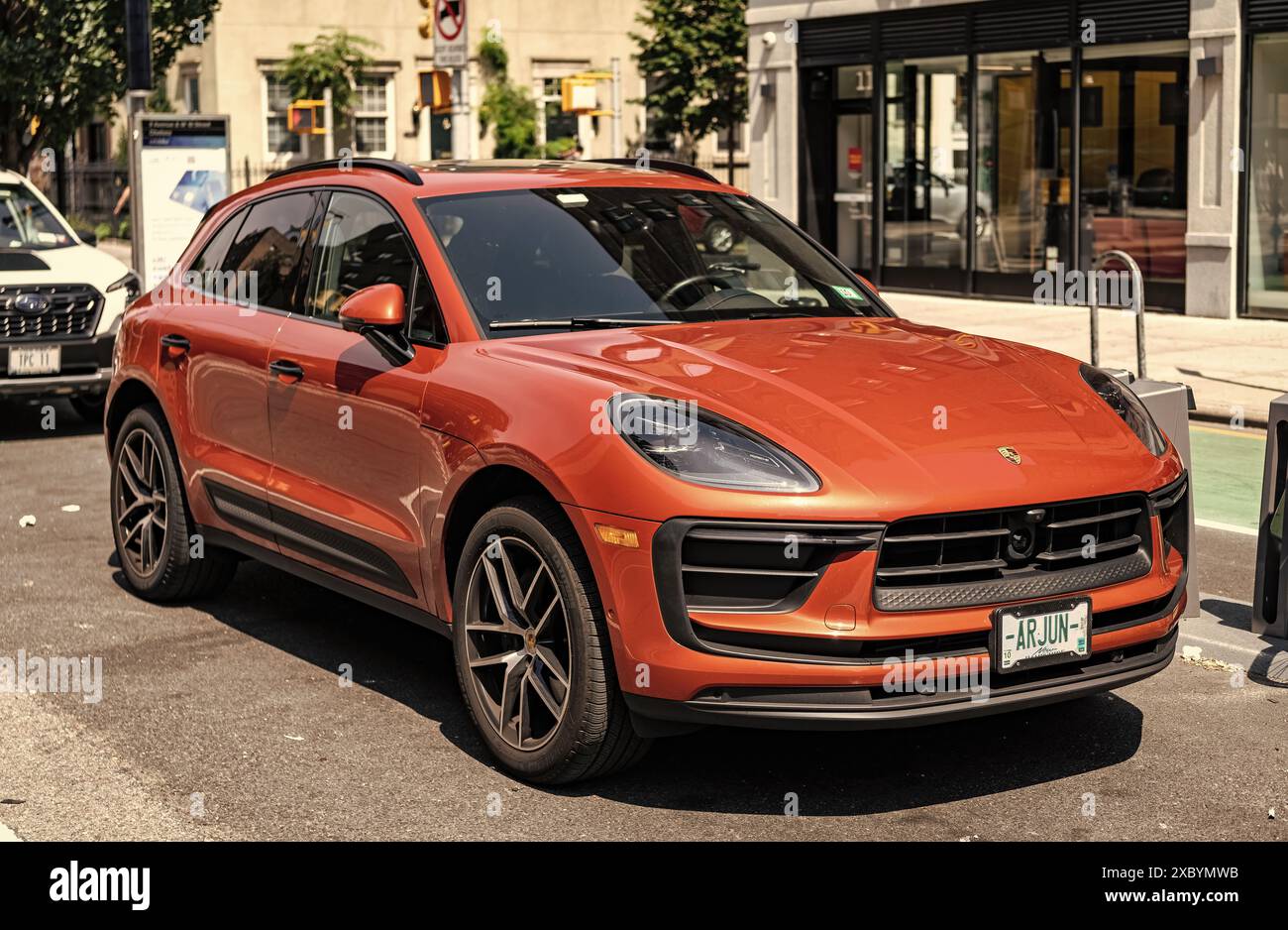 New York City, USA - August 05, 2023: 2023 Porsche Macan T SUV Ruby red ...