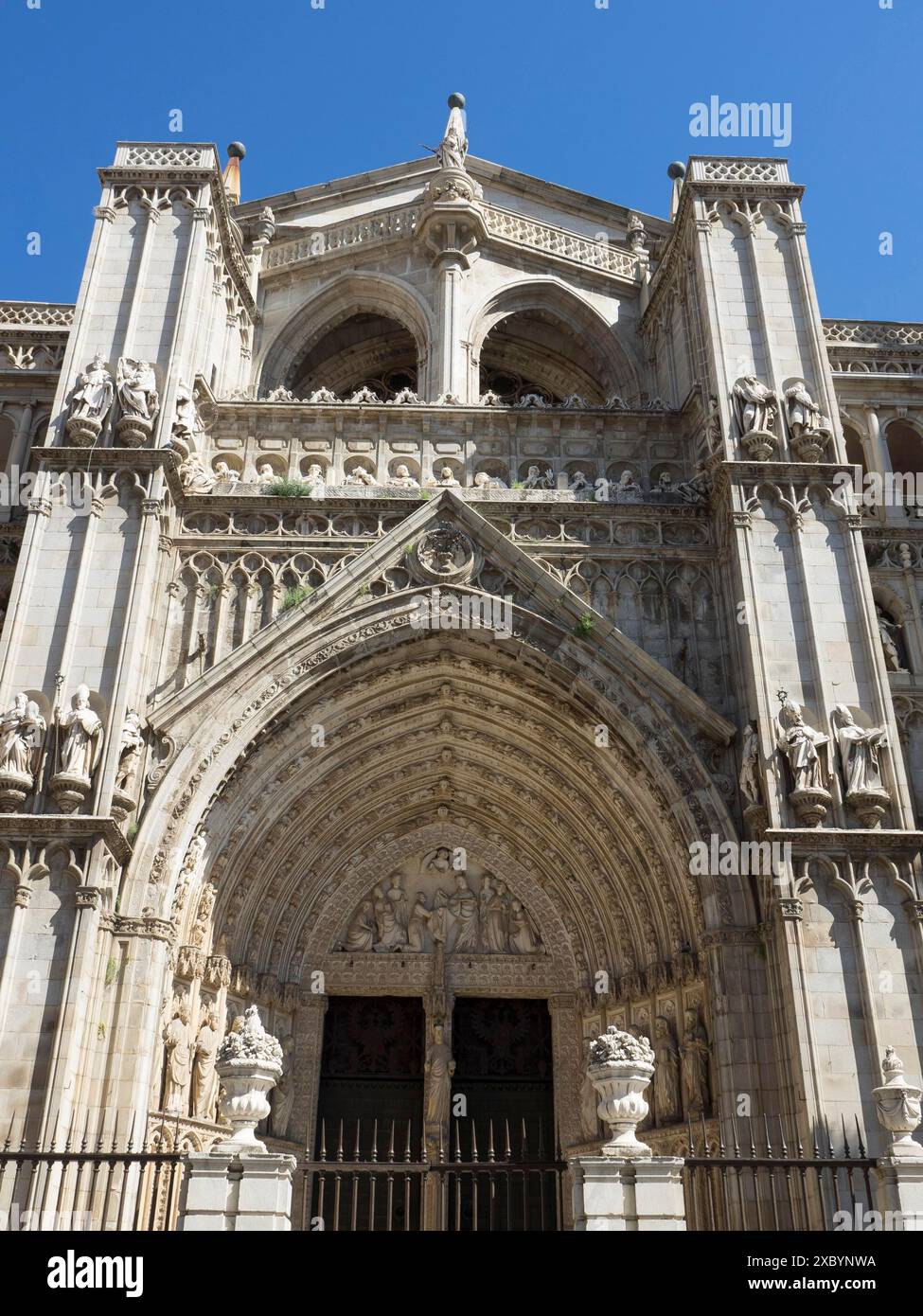 Detailed Gothic entrance facade of a church with impressive sculptures ...