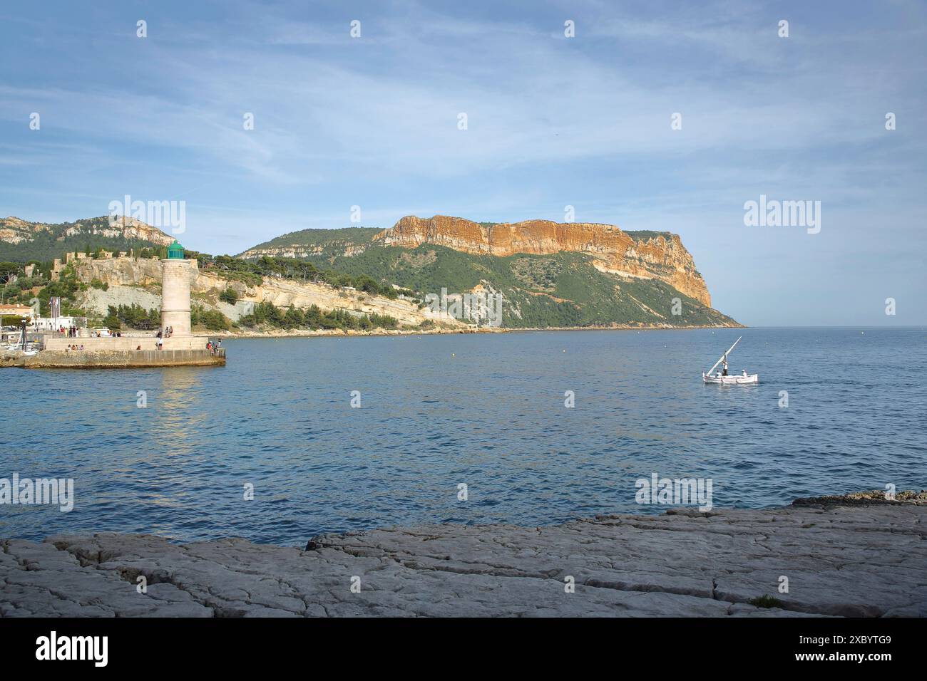 Shore with bay, boat, lighthouse and rock Soubeyran, Cap Canaille ...