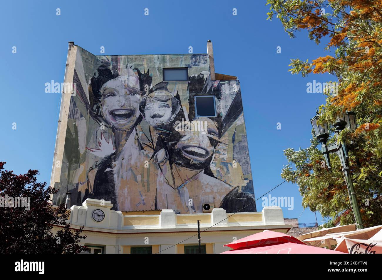 Figure with three different heads, mural by Greek street artist Vasmou ...