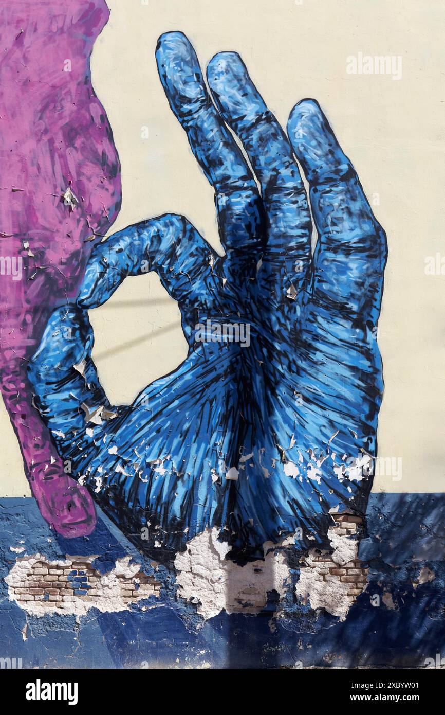 Graffiti with gesture for In order, index finger and thumb formed into ...