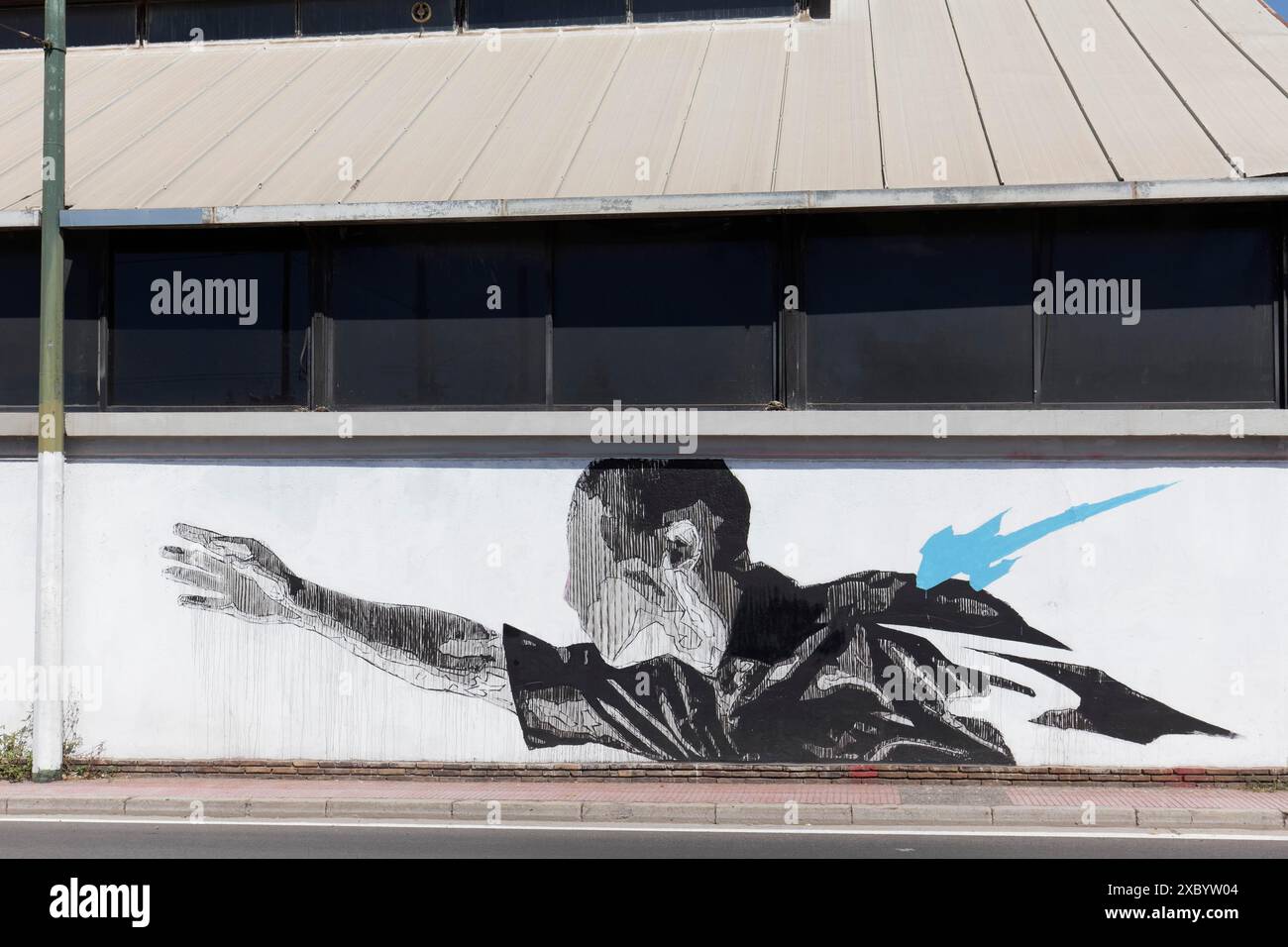 Man with outstretched arm, surreal mural in black and white by Greek ...