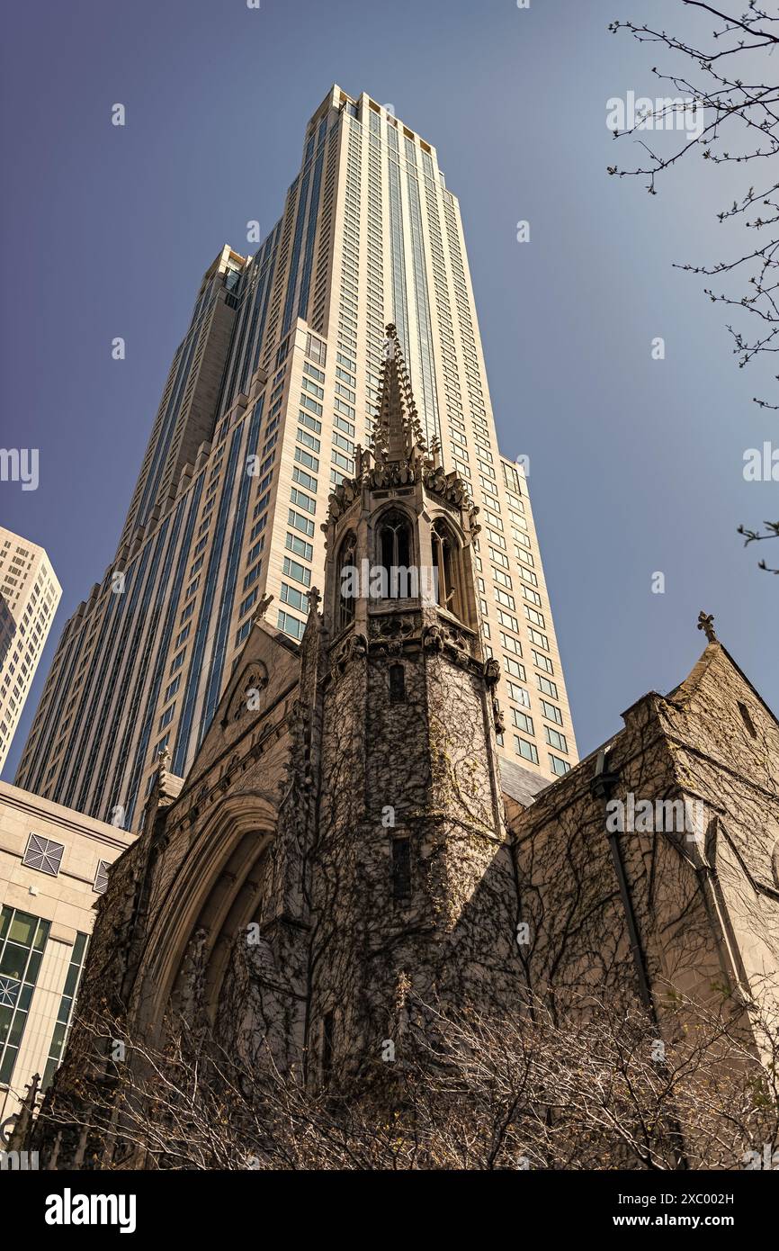 presbyterian church. gothic architecture of church with skyscraper on ...