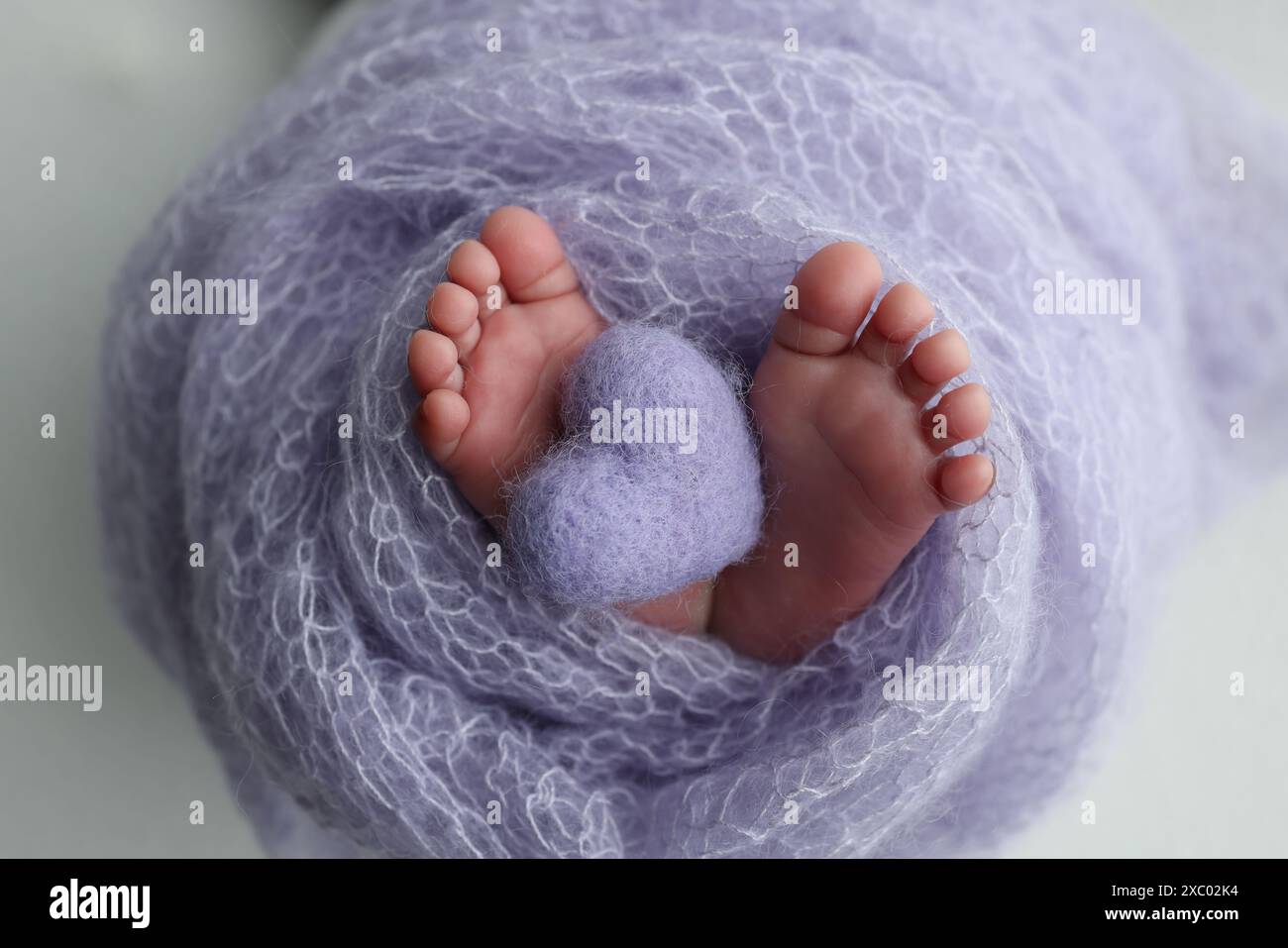 Premature baby feet heart hi-res stock photography and images - Alamy