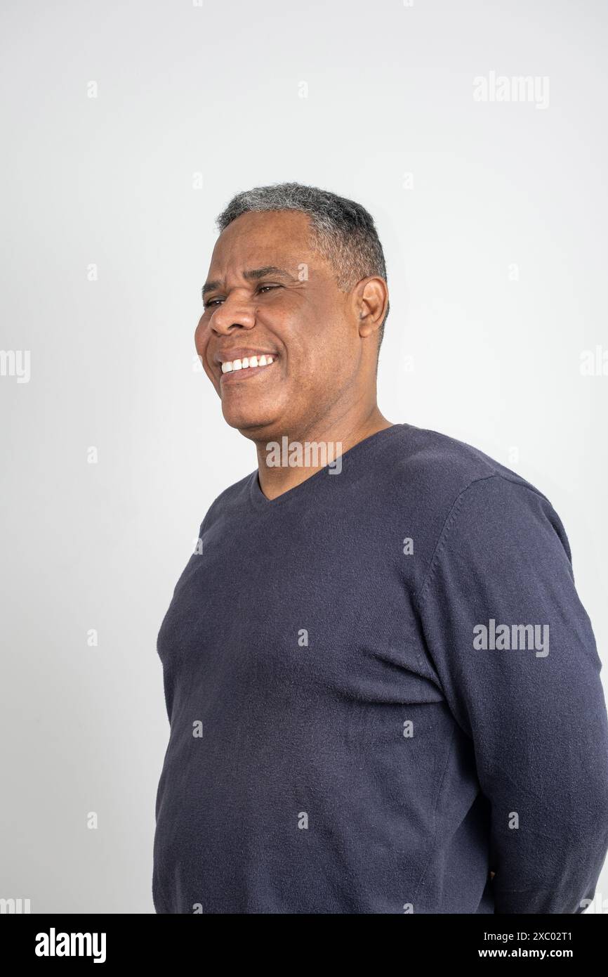 51 year old Brazilian man, black and smiling, facing the camera 11 ...