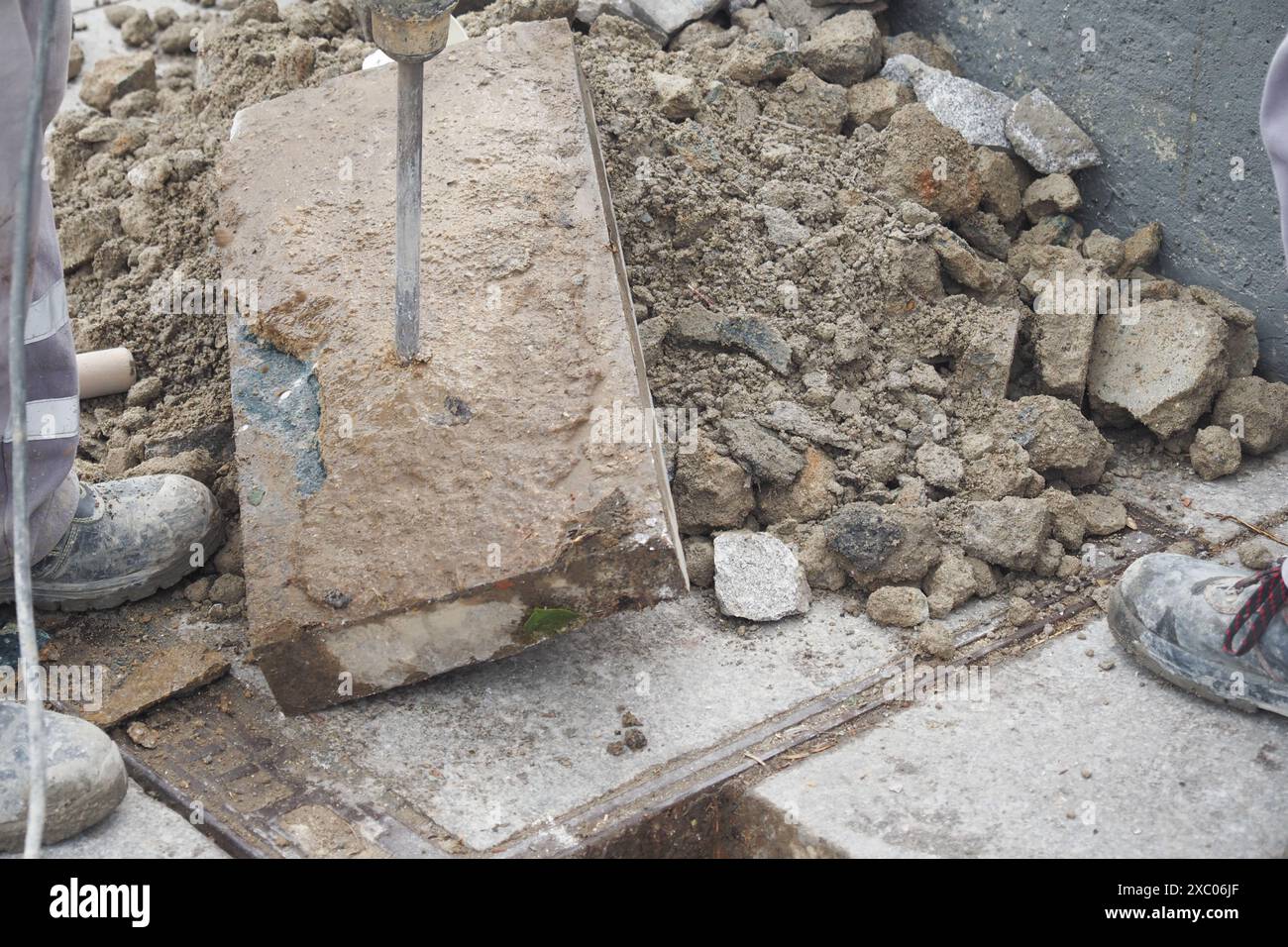 Using hammer break through bedrock hi-res stock photography and images ...