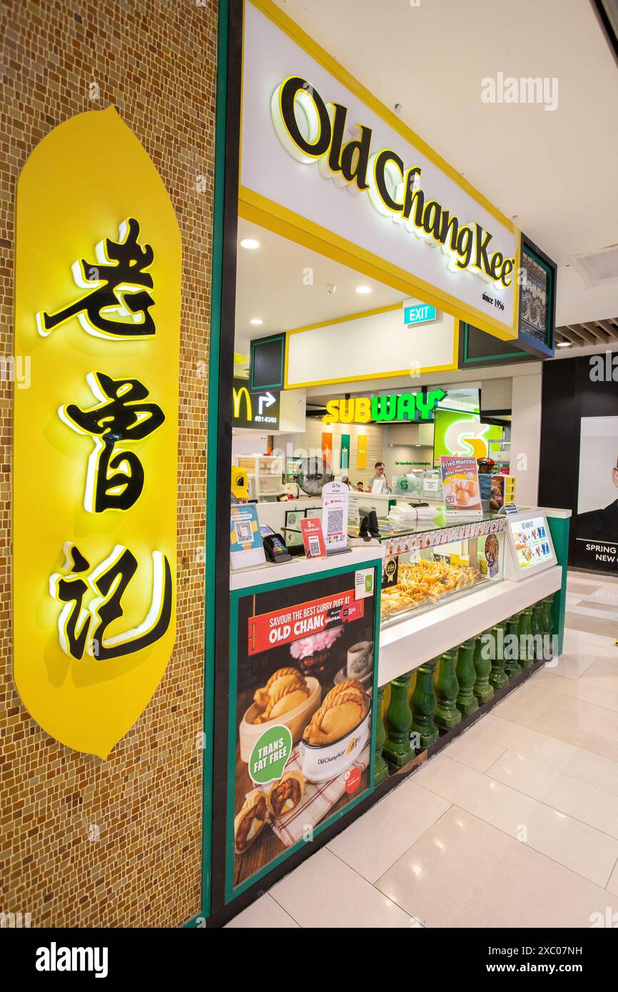 Vertical side view of Old Chang Kee outlet, with Chinese and English ...