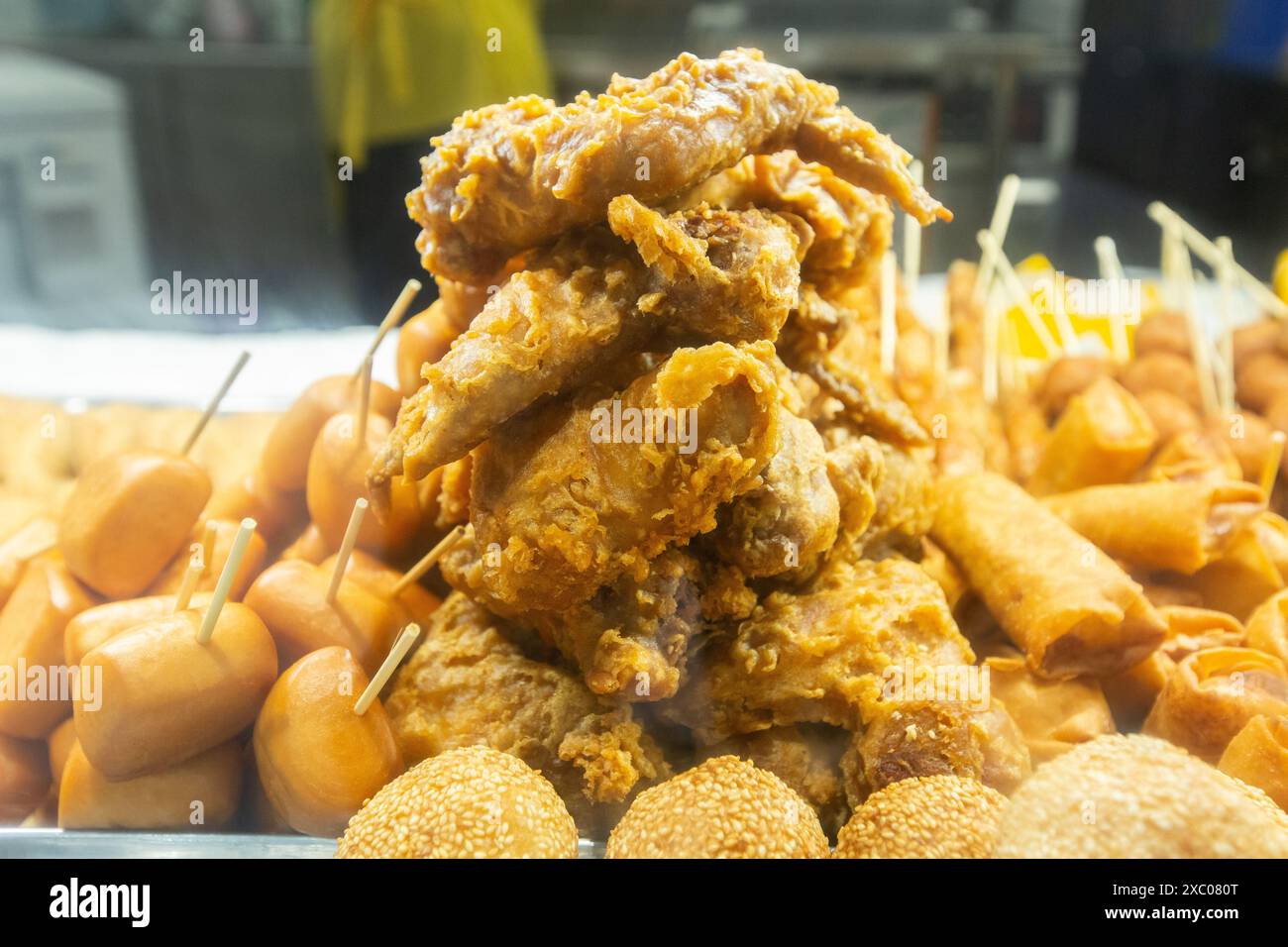 Display of popular fried crispy chicken wing stacked up. Serving hungry ...