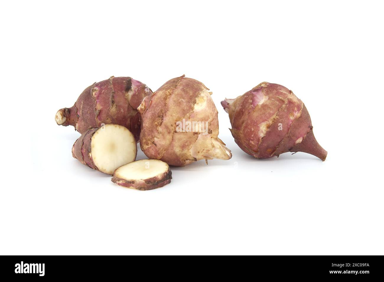 Jerusalem artichokes (sunchokes) tubers isolated on white background ...