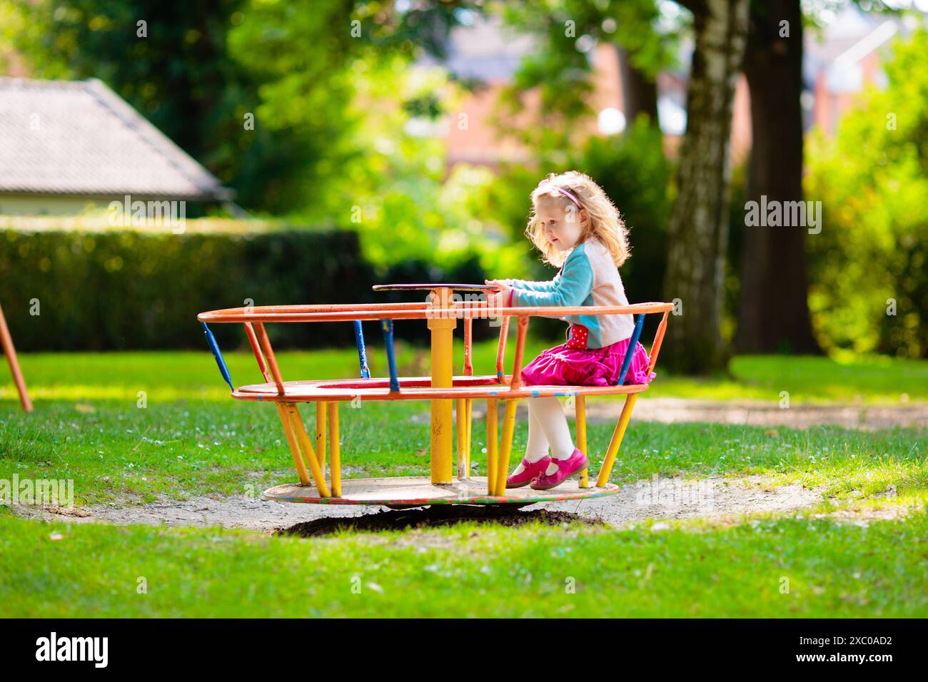 Kids explore nature. Children play in sunny park. Child on playground ...