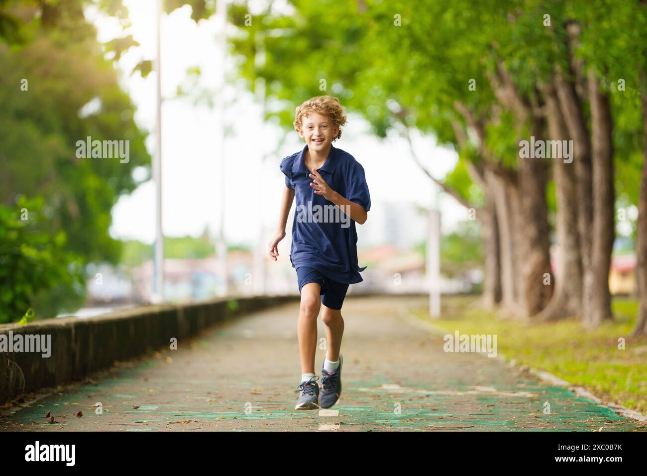 Kids run in summer park. Active child running. Sport for children ...