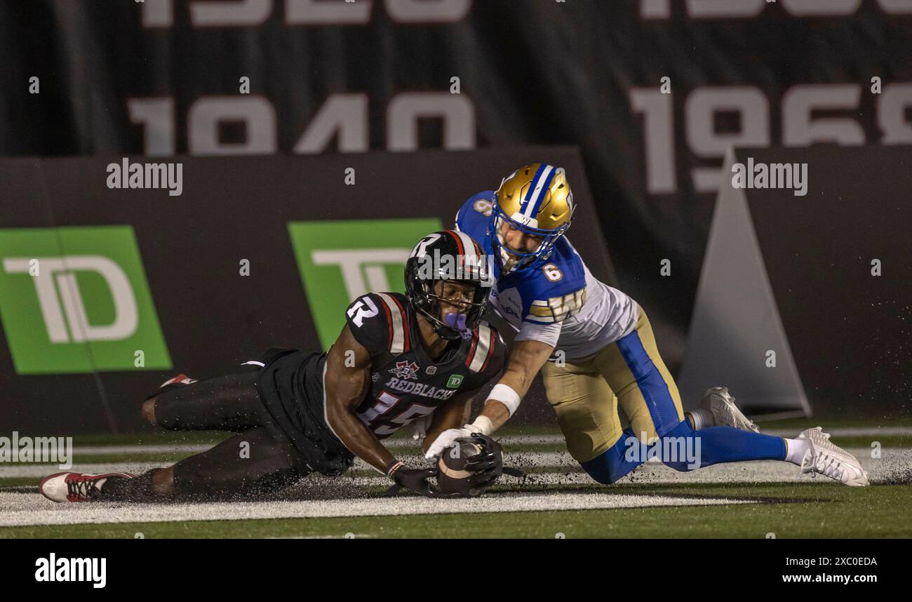 Ottawa, Canada. 13 Jun 2024. Dominique Rhymes (15) of the Ottawa Redblacks and Redha Kramdi (6 ...