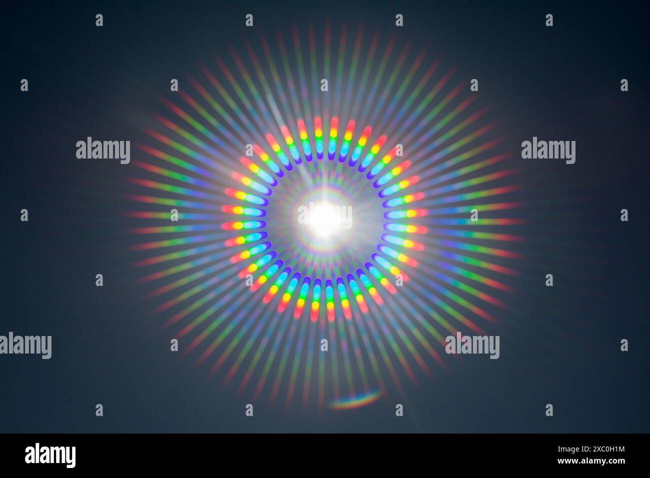 A circle of spectrum rainbows lights Stock Photo - Alamy